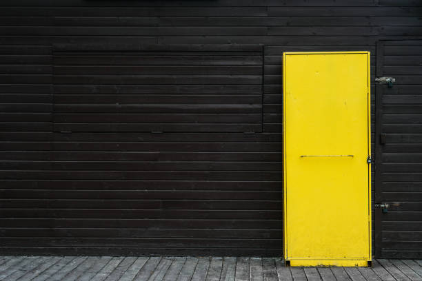 Free Stock Photo of Yellow Door in Front of Black Fence | Download Free ...