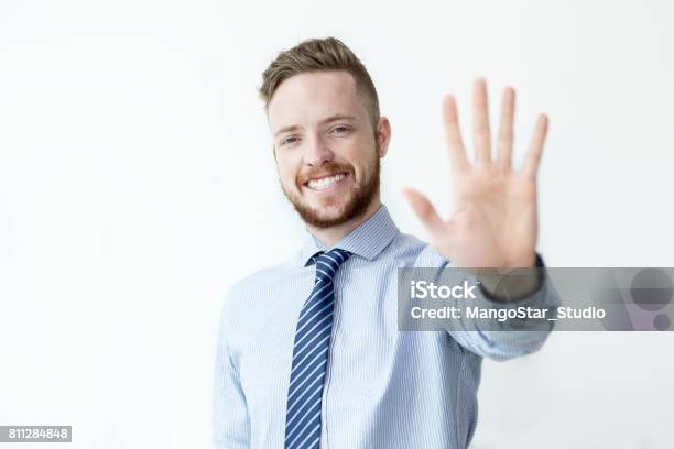 Smiling Business Man Showing Stop Gesture Stock Photo - Download Image ... Smiling Business Man Showing Stop Gesture Stock Photo - Download Image ...