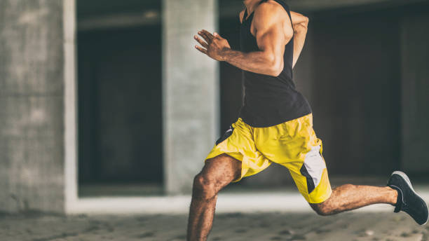Free Stock Photo of Man Running on Street in Red Shorts and Black Shirt ...