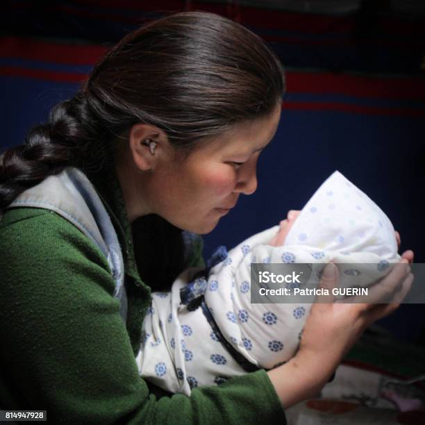 Portrait Of Mother And Child In A Yurt In The Mongolian Steppe Stock ... Portrait Of Mother And Child In A Yurt In The Mongolian Steppe Stock ...