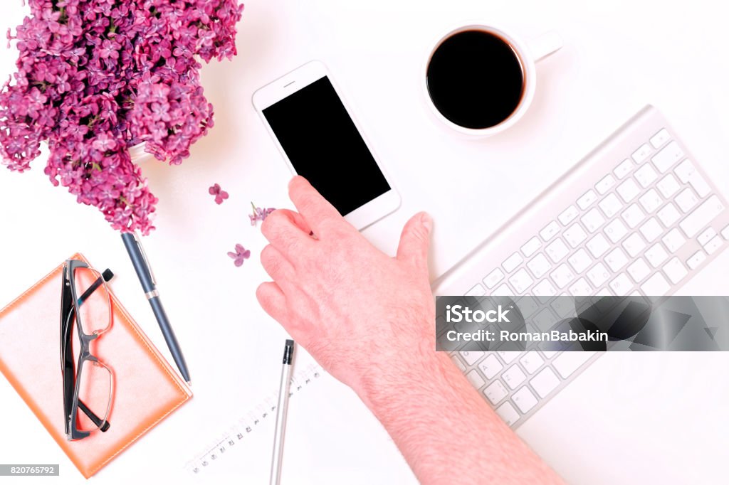 Man Hand Holding Mobile Phone Workplace Keyboard Glasses Coffee Lilac