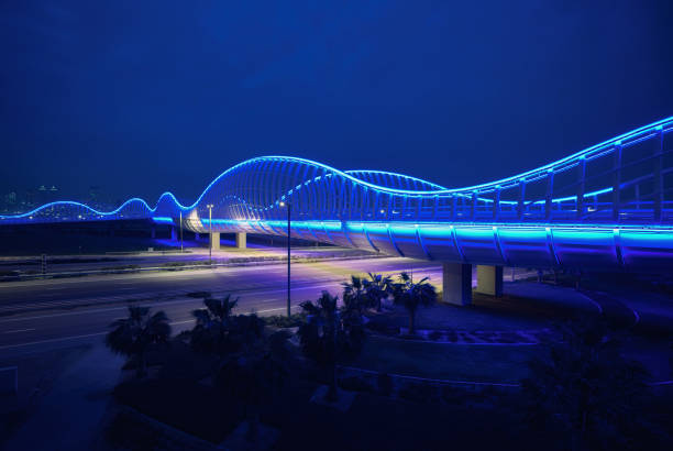 Free Stock Photo of Modern bridge illuminated in blue over a waterfront ...
