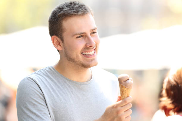 Free Stock Photo of Man Holding Chocolate Ice Cream Cone | Download ...