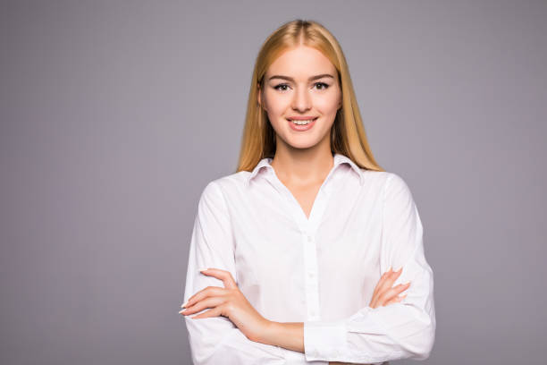 560 Portrait Of Smiling Business Woman With Folded Hands Isolated On
