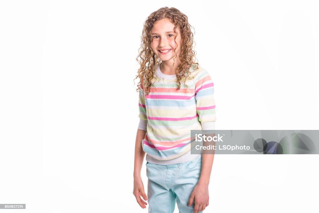 Portrait Of Happy Smiling Confident 9 Years Old Girl With Curly Hair