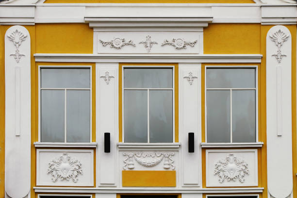 Free Stock Photo of Classic yellow building facade with ornate details ...