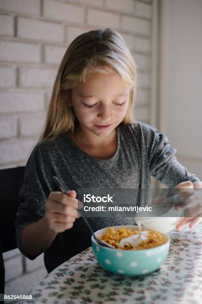 Girl Having Cronflex With Yogurt Stock Photo - Download Image Now - 10 ... Girl Having Cronflex With Yogurt Stock Photo - Download Image Now - 10 ...