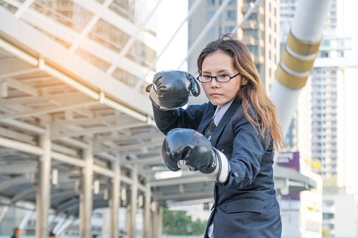 Businesswoman Punching In The City Stock Photo - Download Image Now ... Businesswoman Punching In The City Stock Photo - Download Image Now ...