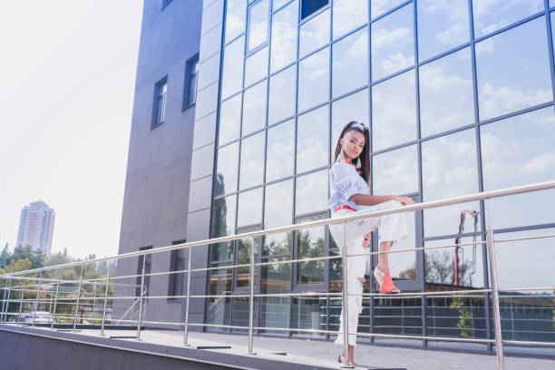 Free Stock Photo of Young woman leaning on modern railing | Download ...