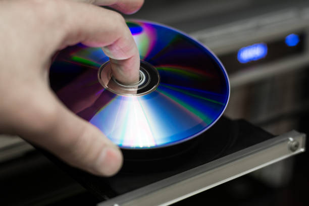 30+ Hands Inserting Dvd Discs Into Players Stock Photos, Pictures ... 30+ Hands Inserting Dvd Discs Into Players Stock Photos, Pictures ...