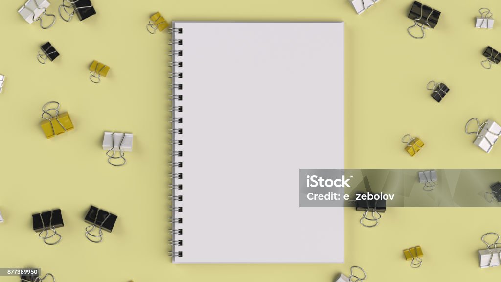 Notebook Spiral Kosong Dengan Klip Pengikat Hitam Putih Dan Kuning Pada ... Notebook Spiral Kosong Dengan Klip Pengikat Hitam Putih Dan Kuning Pada ...