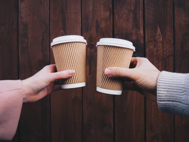 Free Stock Photo of A hand holding two cups of coffee | Download Free ...