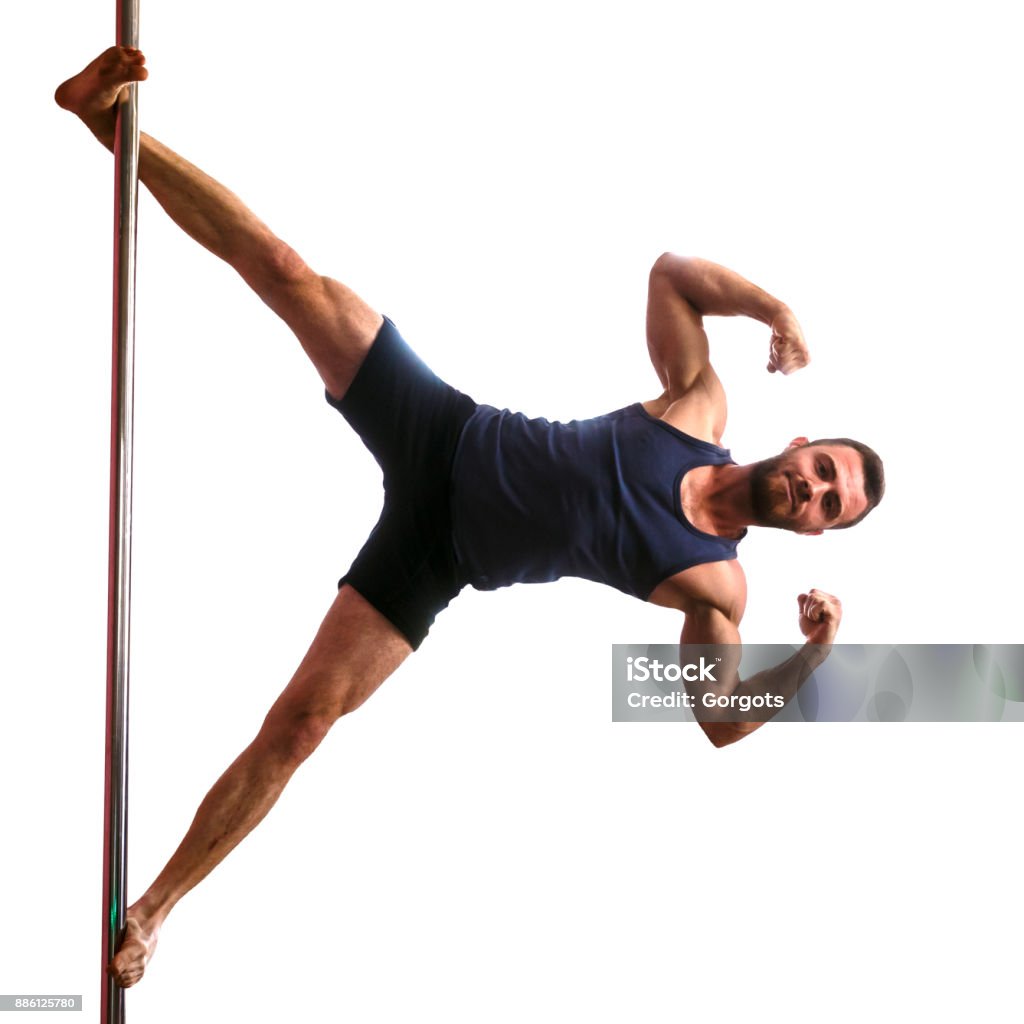 Young Athletic Blond Girl Doing Strength Exercises On A Pylon Pole