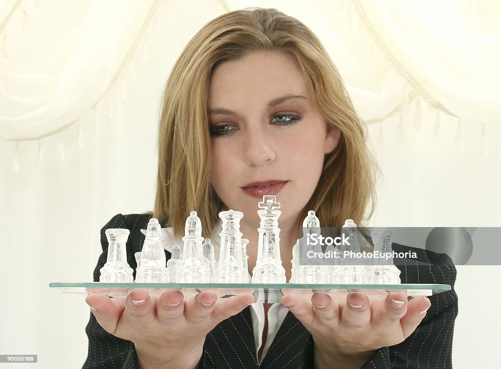 Beautiful Twenty Five Year Old Business Woman With Chess Set Stock