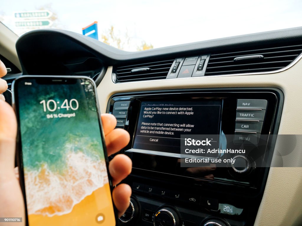 Man Connecting To Apple Carplay The New Iphone X 10 By Apple Stock ... Man Connecting To Apple Carplay The New Iphone X 10 By Apple Stock ...