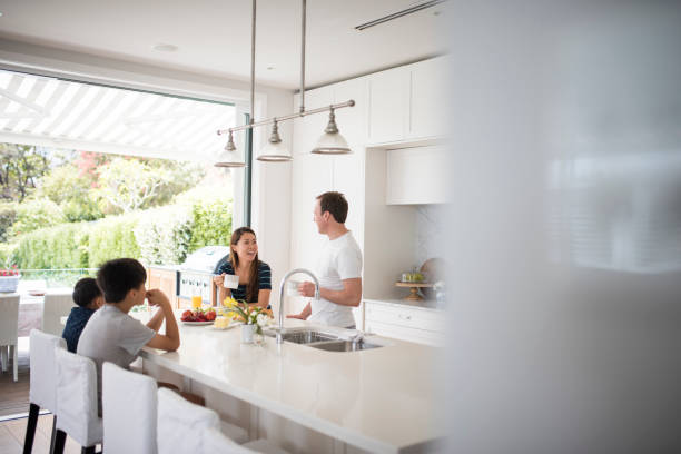 Free Stock Photo of Family preparing breakfast together in kitchen ...