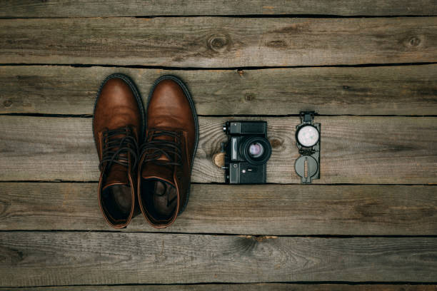 Free Stock Photo of Shoes, Tie, and Camera on Wooden Floor | Download ...