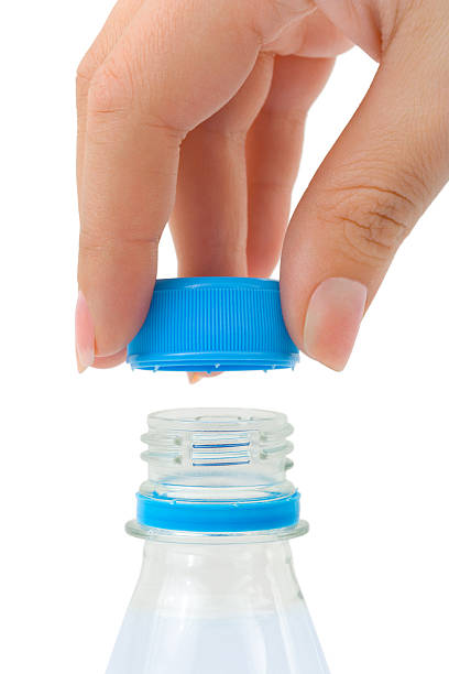 Free Stock Photo of Fingers removing cap from chemical bottle ...