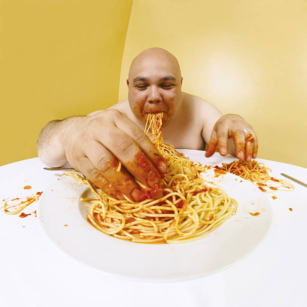 170+ Fat Man Eating Pasta Stock Photos, Pictures & Royalty-Free Images ... 170+ Fat Man Eating Pasta Stock Photos, Pictures & Royalty-Free Images ...