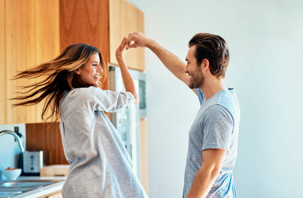 Free Stock Photo of Young couple in the living room of the house in the ...