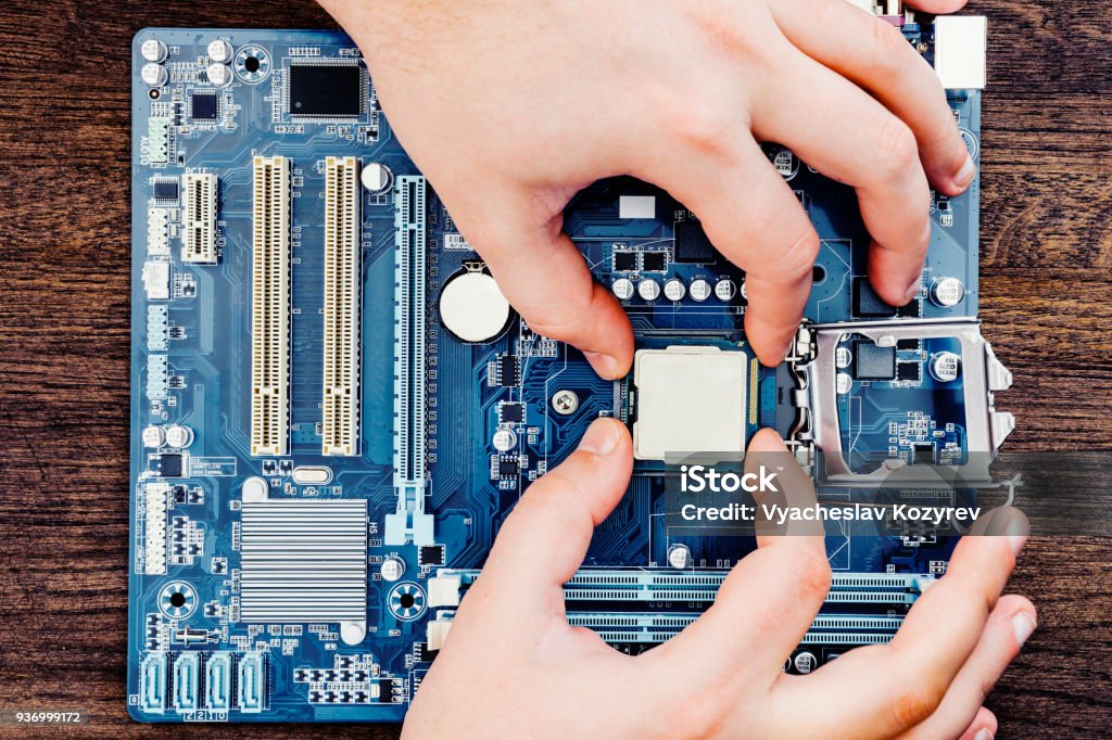 Computer Motherboard And Cpu Installing The Processor Stock Photo ... Computer Motherboard And Cpu Installing The Processor Stock Photo ...