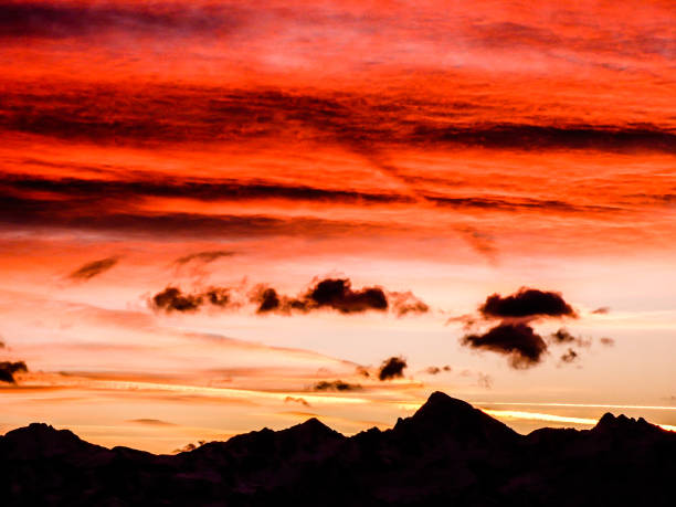 Fire In The Sky: Sunset Clouds Over The Swiss Alps – Free Stock Photo