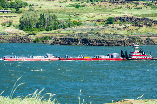 Tugboat Pushing Fish Barge On Columbia River Stock Photo - Download ... Tugboat Pushing Fish Barge On Columbia River Stock Photo - Download ...