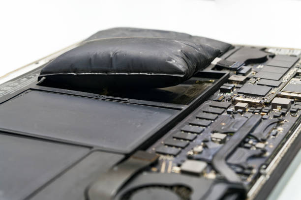 Swollen Lithium Ion Batteries Stock Photos, Pictures & Royalty-Free ... Swollen Lithium Ion Batteries Stock Photos, Pictures & Royalty-Free ...