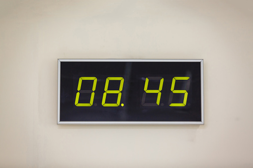 Black Digital Clock On A White Background Showing Time 8 Hours 45 ... Black Digital Clock On A White Background Showing Time 8 Hours 45 ...