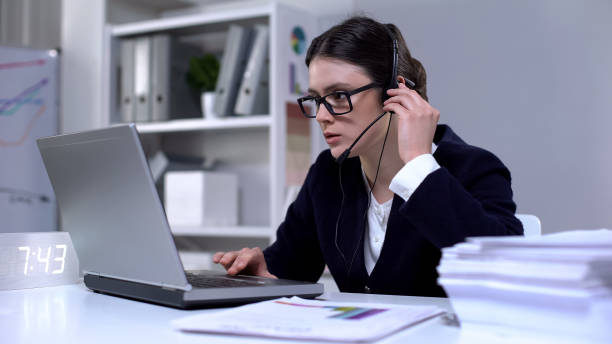 Serious Call Center Agent On Phone Stock Photos, Pictures & Royalty ... Serious Call Center Agent On Phone Stock Photos, Pictures & Royalty ...