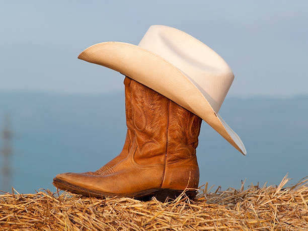 Royalty Free Cowboy Hat And Boots Pictures, Images and Stock Photos ... Royalty Free Cowboy Hat And Boots Pictures, Images and Stock Photos ...