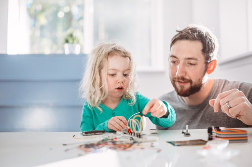 Dad Teaching Daughter Electrical Engineering Stock Photo - Download ... Dad Teaching Daughter Electrical Engineering Stock Photo - Download ...