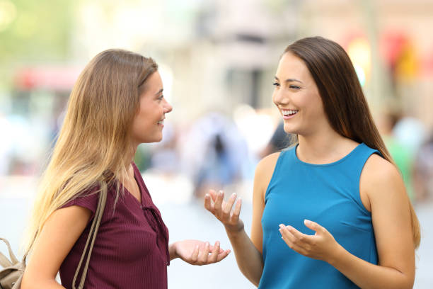 Best Two People Standing Facing Each Other Stock Photos, Pictures ... Best Two People Standing Facing Each Other Stock Photos, Pictures ...