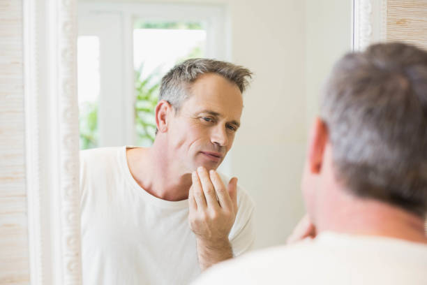 Royalty Free Man Looking In Mirror Pictures, Images and Stock Photos ... Royalty Free Man Looking In Mirror Pictures, Images and Stock Photos ...
