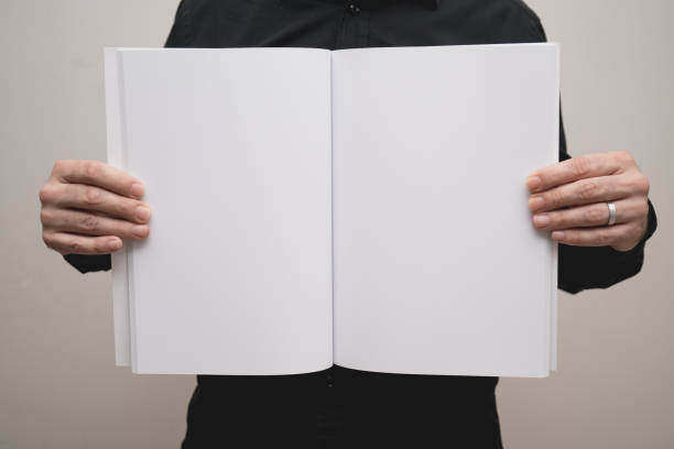 Best Holding Open Blank Book Stock Photos, Pictures & Royalty-Free ... Best Holding Open Blank Book Stock Photos, Pictures & Royalty-Free ...
