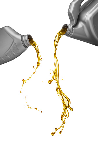 Pouring Engine Oil Stock Photo - Download Image Now - iStock Pouring Engine Oil Stock Photo - Download Image Now - iStock