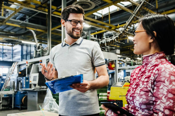 Industrial Workers Talking Stock Photos, Pictures & Royalty-Free Images ... Industrial Workers Talking Stock Photos, Pictures & Royalty-Free Images ...