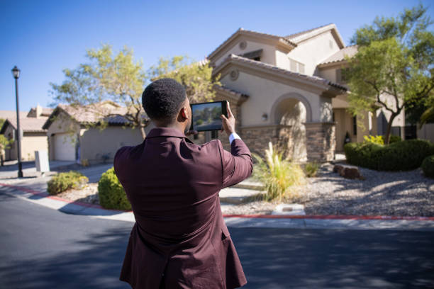 Black Real Estate Agent Showing House Stock Photos, Pictures & Royalty ... Black Real Estate Agent Showing House Stock Photos, Pictures & Royalty ...