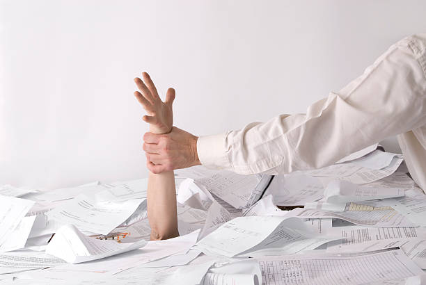 Drowning In Paperwork Stock Photos, Pictures & Royalty-Free Images - iStock Drowning In Paperwork Stock Photos, Pictures & Royalty-Free Images - iStock