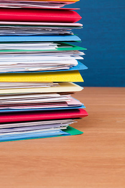 Best Stack Of File Folders On A Wooden Desk Stock Photos, Pictures ... Best Stack Of File Folders On A Wooden Desk Stock Photos, Pictures ...