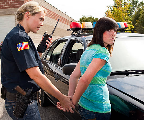 Woman Arrested Handcuffed Pictures, Images and Stock Photos - iStock Woman Arrested Handcuffed Pictures, Images and Stock Photos - iStock