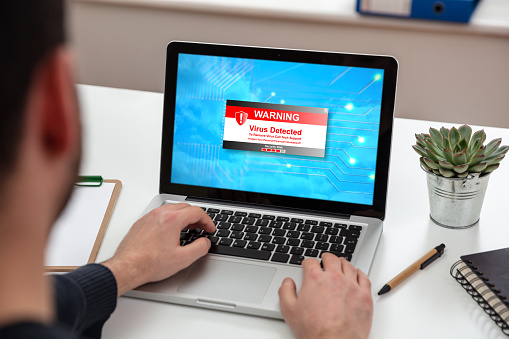 Virus Detected Warning Text On A Laptop Screen Stock Photo - Download ... Virus Detected Warning Text On A Laptop Screen Stock Photo - Download ...