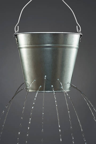 Leaking Bucket Stock Photos, Pictures & Royalty-Free Images - iStock Leaking Bucket Stock Photos, Pictures & Royalty-Free Images - iStock