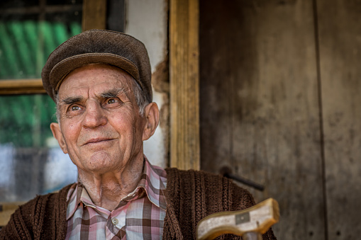 87 Years Old Man Sitting In Front Of Old Village House Stock Photo ... 87 Years Old Man Sitting In Front Of Old Village House Stock Photo ...
