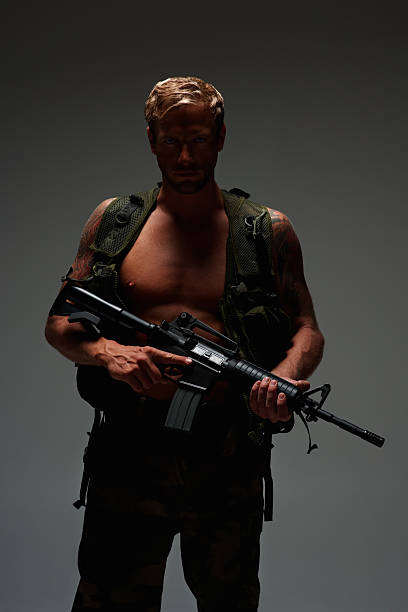Man Holding Machine Gun Stock Photos, Pictures & Royalty-Free Images ... Man Holding Machine Gun Stock Photos, Pictures & Royalty-Free Images ...